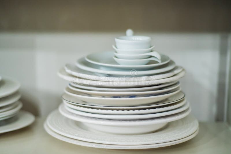 Stack of White Plates in a Cabinet Stock Photo - Image of food, plates ...