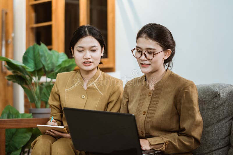 State Official and Assistant in Civil Servant Uniforms Sit Together on ...