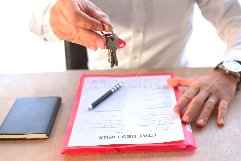 Man Delivery of keys stock photo. Image of control, play - 84358108