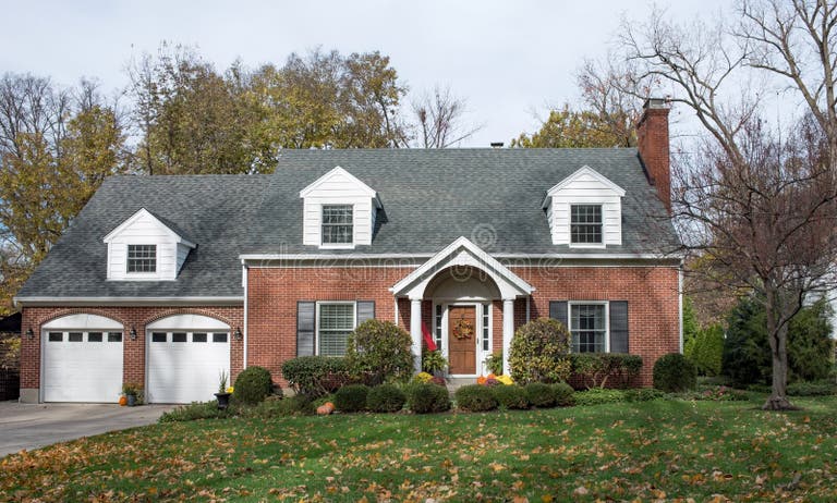 Stately Cape Cod House in Fall Stock Photo - Image of bare, driveway ...