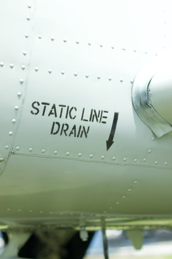 Static Line Drain Decal on an Old Aircraft Stock Photo - Image of navy ...