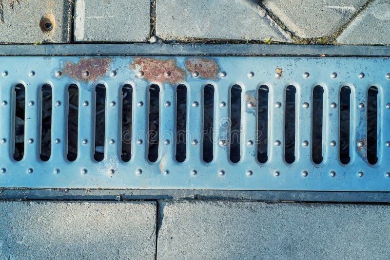 Static Shot of Storm Drain in Road Stock Photo - Image of drain, rise ...