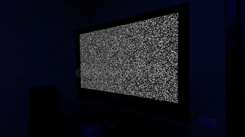 Static Television Screen Displaying Noise in a Dark Room Stock Footage ...
