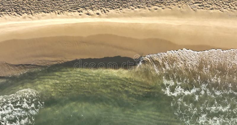 Static Top Down View of Tropical Beach, Foamy Ocean Waves Washing Sand ...