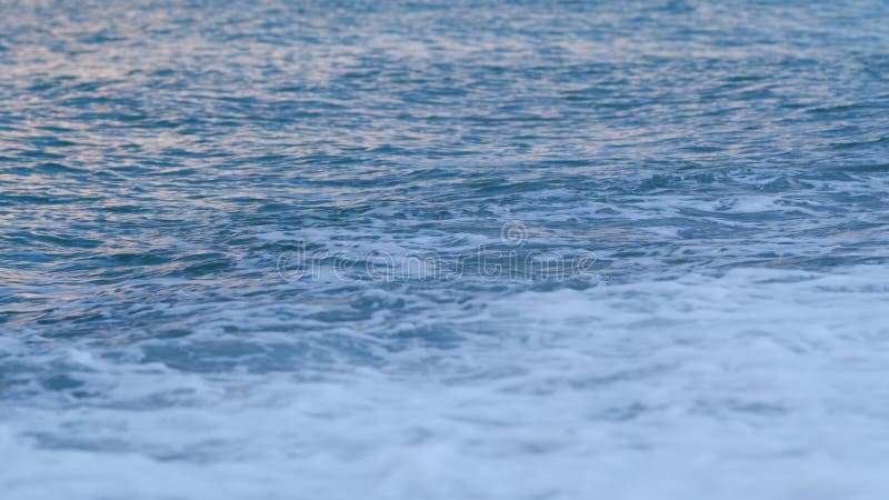 Waves in Sea Under Cloudless Sky during Sunset. Sunset on Dark Sea ...