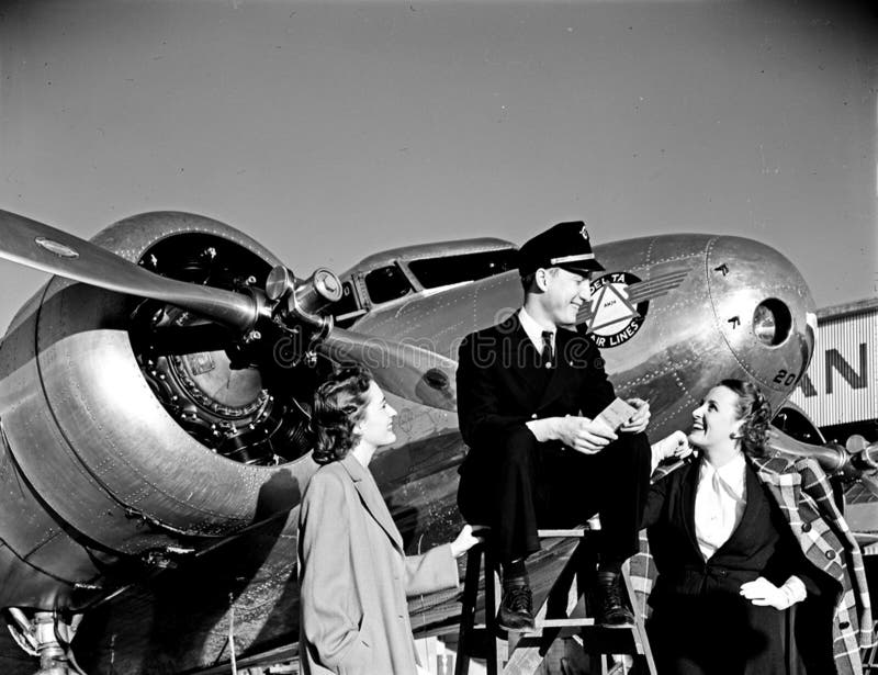 [Station Agent And Two Models In Front Of Lockheed 10B Electra, Delta ...