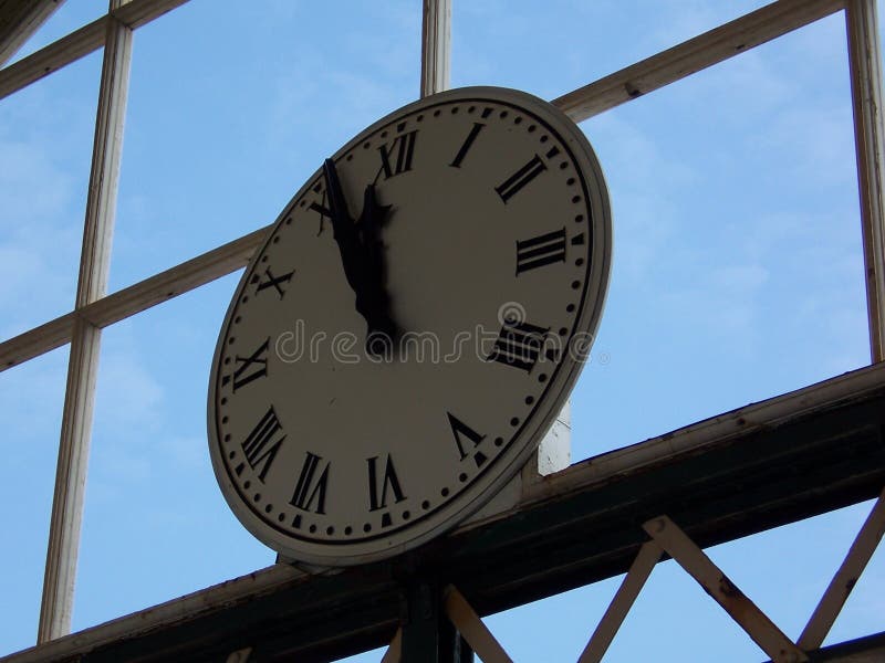 Station clock stock image. Image of finger, station, minutes - 350857