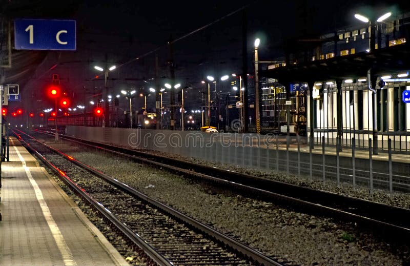 Station platform at night stock photo. Image of track - 68681916