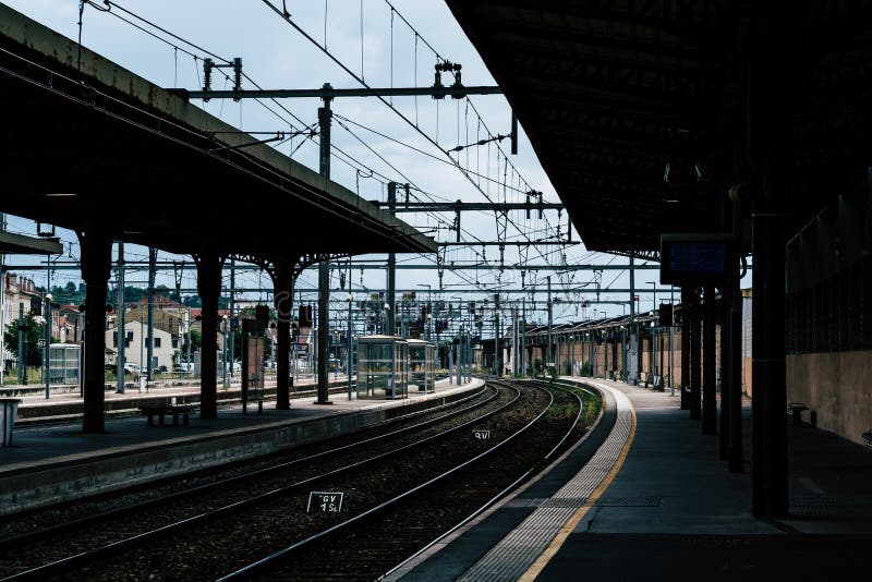 Station Platform with Rails and Metallic Stucture Stock Photo - Image ...
