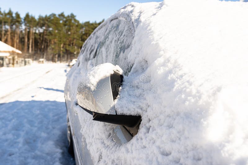 A Station Wagon Car Standing in Front of a Panel Fence Covered with Ice ...