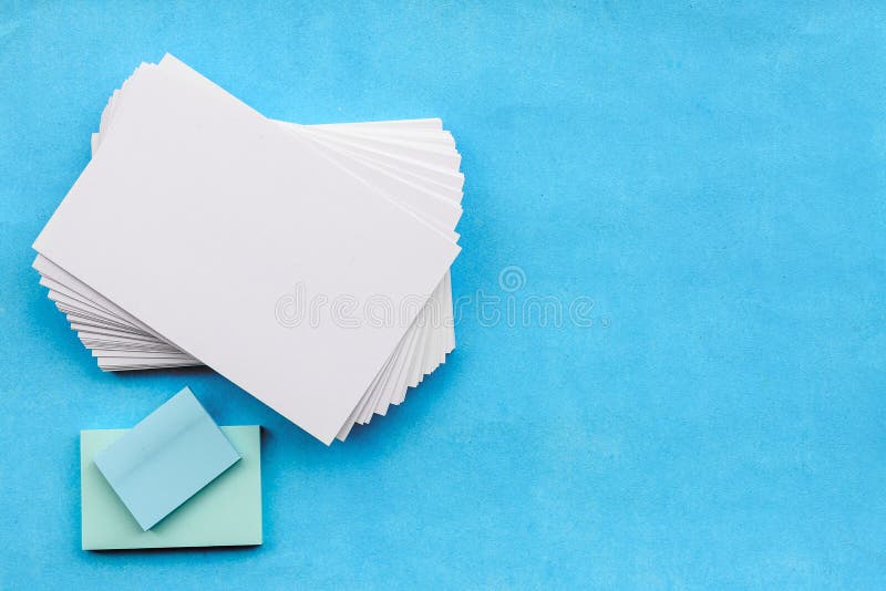 Stationery Layout on a Blue Background-a Stack of Empty White Cards ...