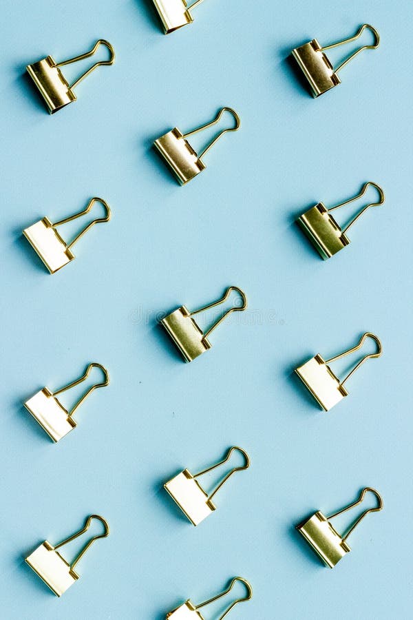 Stationery Pattern. Paper Binder Clips Top View Stock Photo - Image of ...