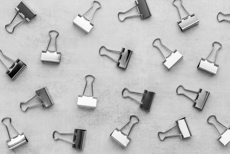 Stationery Pattern. Paper Binder Clips Top View Stock Photo - Image of ...