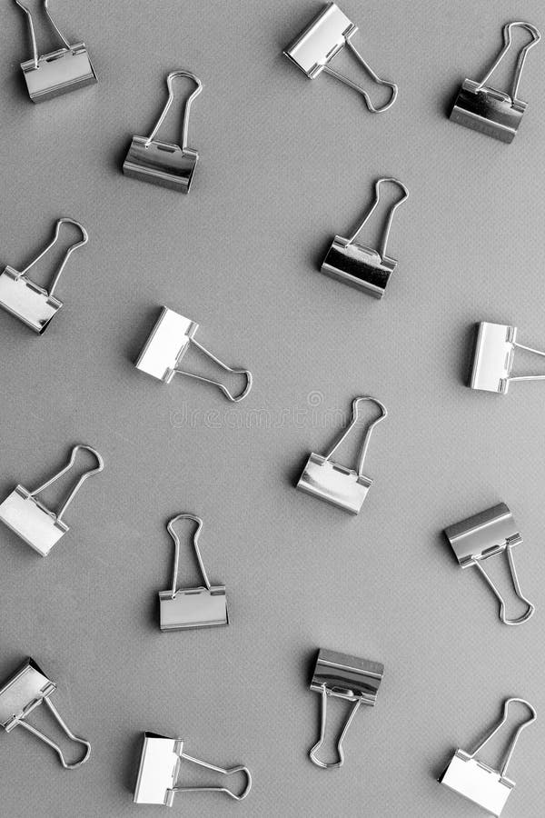 Stationery Pattern. Paper Binder Clips Top View Stock Image - Image of ...