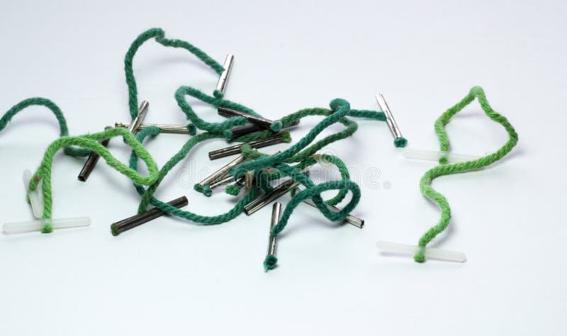 Stationery-treasury Tags or String Paper Fasteners. Stock Photo - Image ...