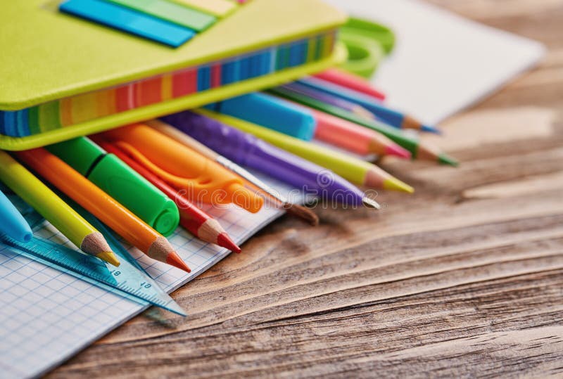 Stationery Under a Bright Notebook on the Table Stock Image - Image of ...