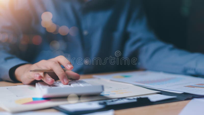 Statistical Analyst Using Calculator To Calculate and Read Reports ...