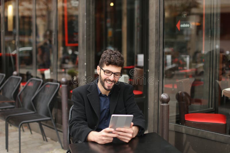 Statistician Working with Diagram and Tablet at Cafe Table . Stock ...