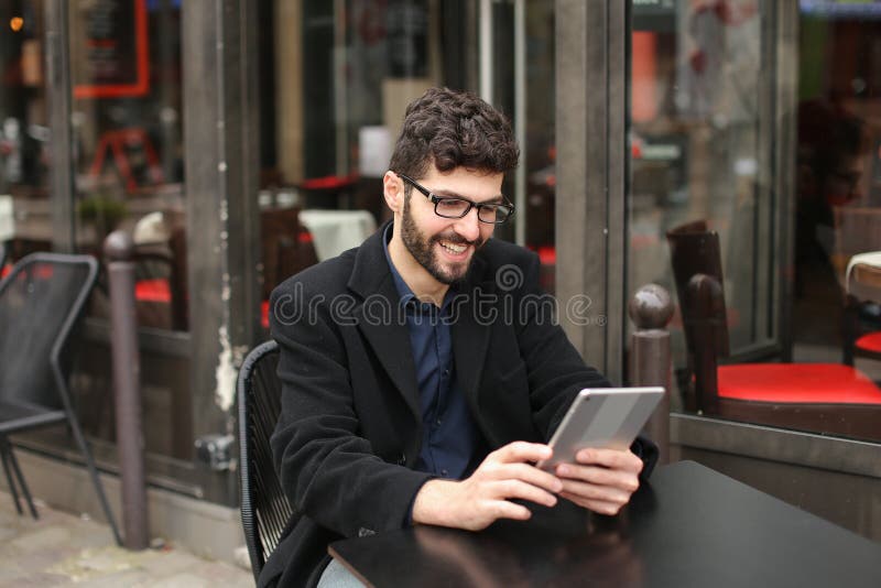 Statistician Working with Diagram and Tablet at Cafe Table . Stock ...