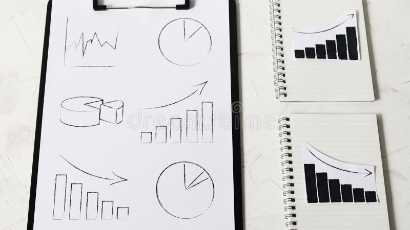 Statistics Concept, Positive and Negative Trends on Graphs on Notebooks ...