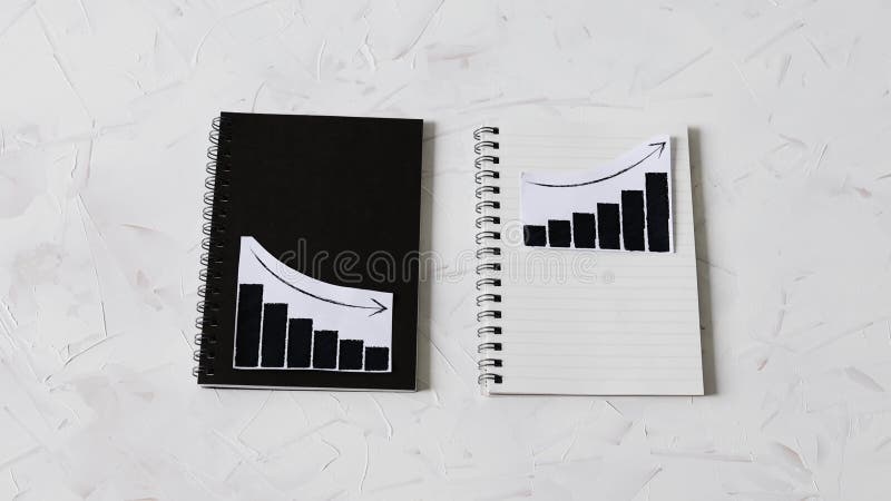 Statistics Concept, Positive and Negative Trends on Graphs on Notebooks ...