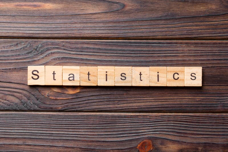 Statistics Word Written on Wood Block. Statistics Text on Cement Table ...