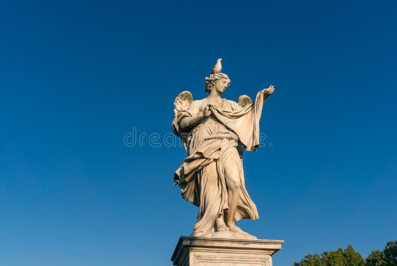 Statue of Angel with Bird Sitting on Its Head Stock Image - Image of ...