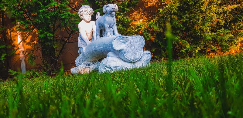 Statue stock photo. Image of statue, chasing, sunlight - 122627340