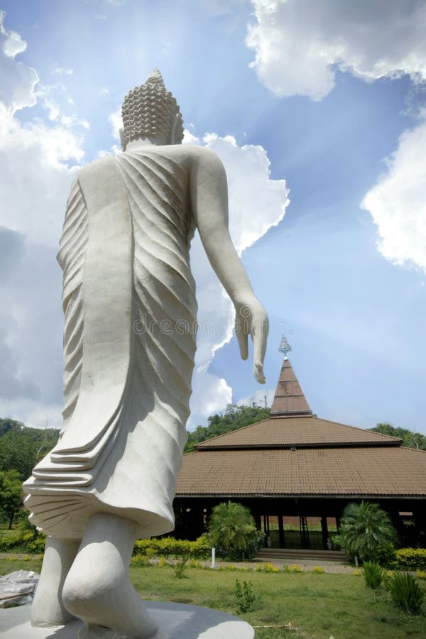 Statue of Buddha Walking with Beam Stock Photo - Image of green, peace ...