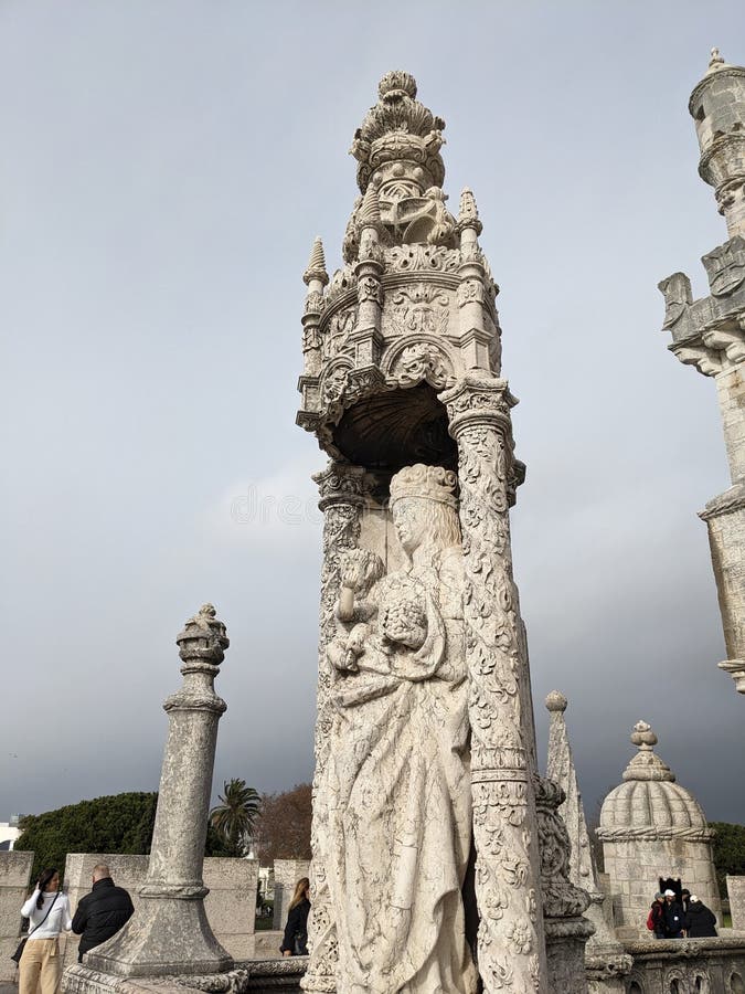 A Statue in a Building Next To Some Pillars and Benches Stock Image ...