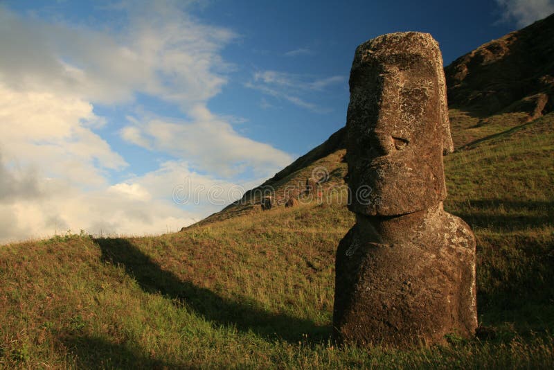 Statue buried in grass stock photo. Image of statue, volcanic - 15583676