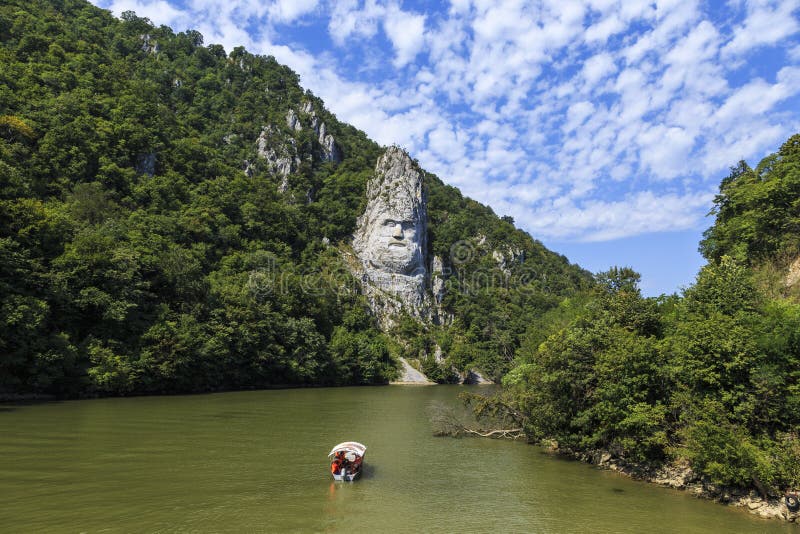 Statue Carved in Stone Over River Stock Photo - Image of colors ...