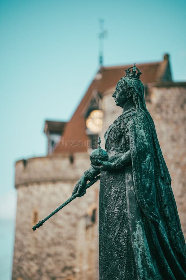 Statue and Castle Tower Under Clear Sky Stock Illustration ...