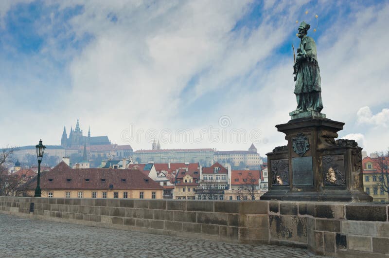 Statue in Charles Bridge,Prague Castle View Stock Photo - Image of ...