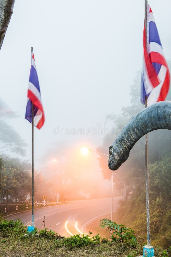 Statue of Chiang Muan Dinosaur with Curve Road Stock Image - Image of ...
