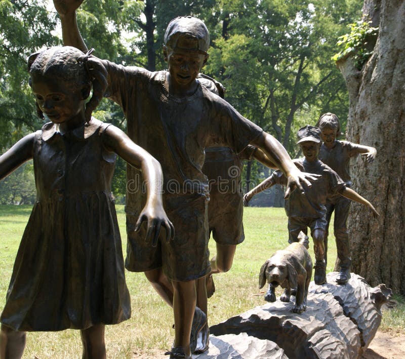 Statue Of Children On Log Picture. Image: 3004068