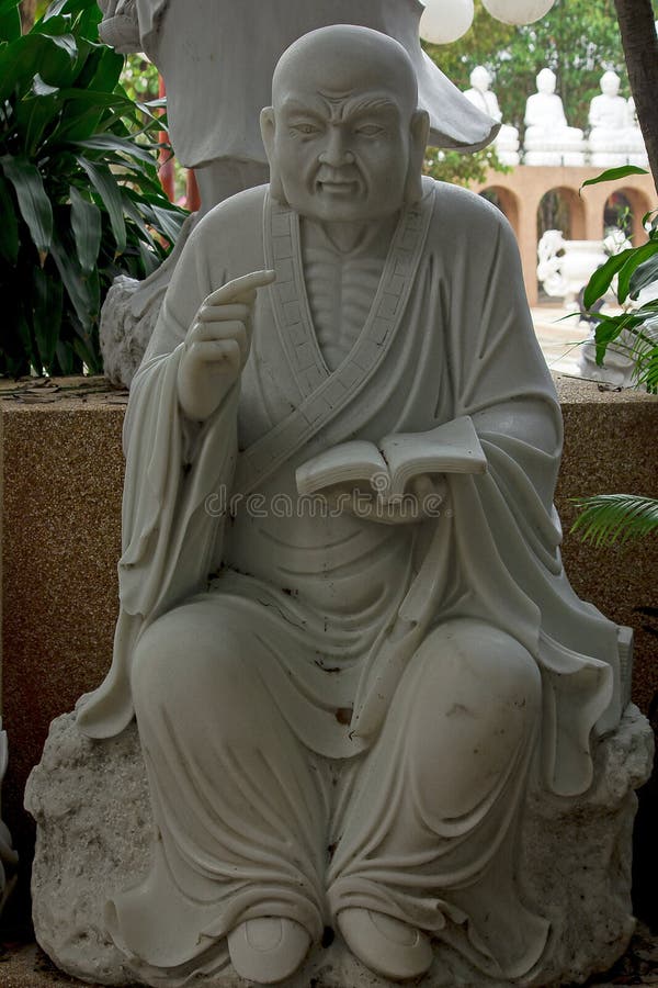 Statue of Chinese Priest Carved from White Marble. Stock Image - Image ...