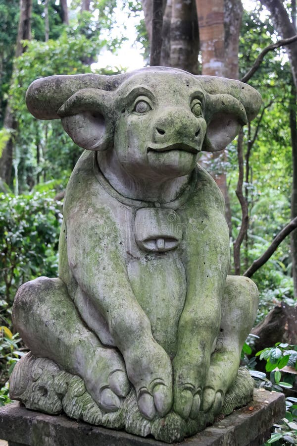 A statue of a cow stock image. Image of bali, seated - 59006543
