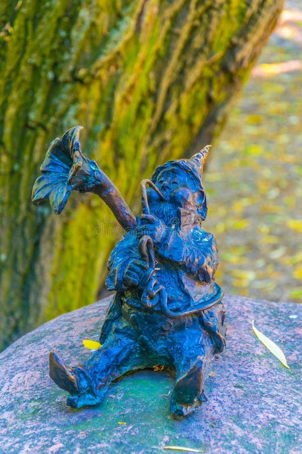 Statue of a Dwarf Musician at Wroclaw, Poland...IMAGE Editorial Stock ...