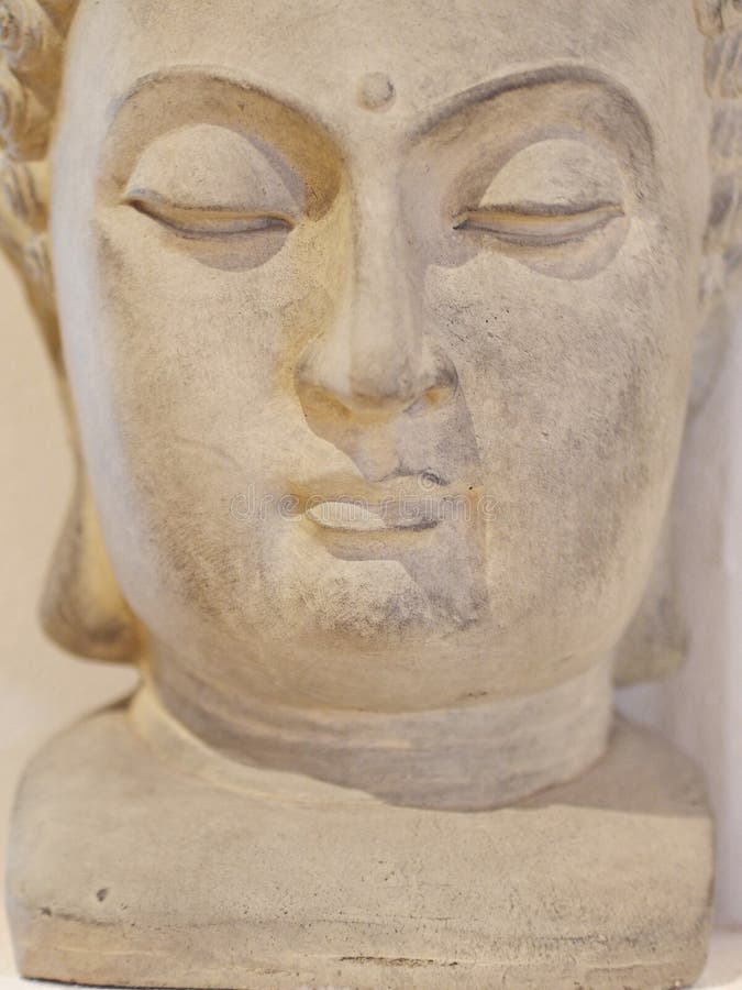 A Statue of a Face with a Serene Expression Stock Photo - Image of ...