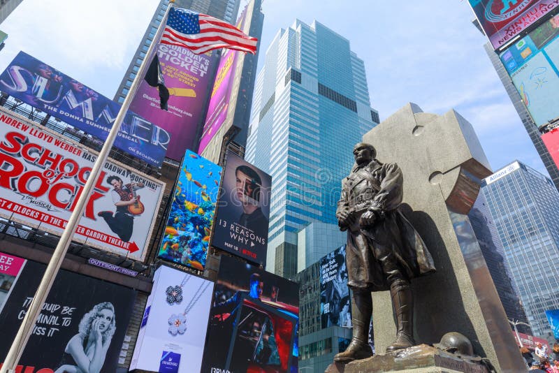 The Statue Of Father Duffy With Street Signs In Times Square New York