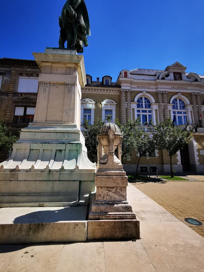 A Statue in Front of a Building Editorial Photography - Image of room ...