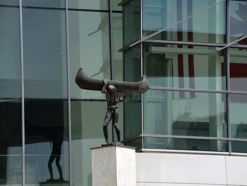 Statue in Front of a Modern Building in Downtown Detroit, Michigan ...