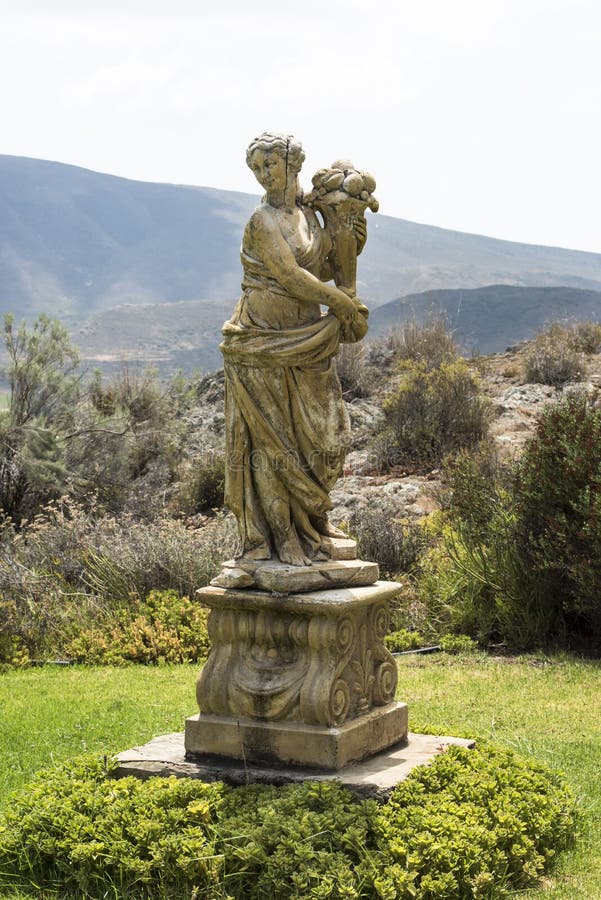 Statue in Garden stock image. Image of antique, sculpture - 66526203