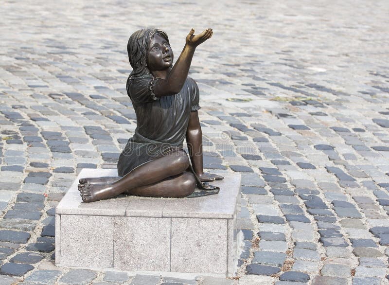 Statue - RAW format stock photo. Image of little, pavement - 75731404