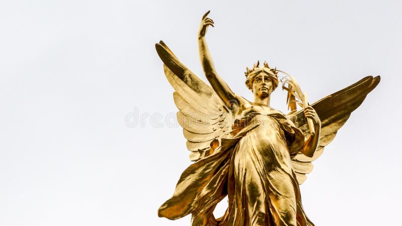 Statue of Gold Angel Reaching Toward the Sky Stock Image - Image of ...