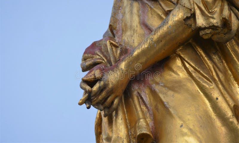 Statue of an Golden Angel with Folded Hands Stock Image - Image of ...