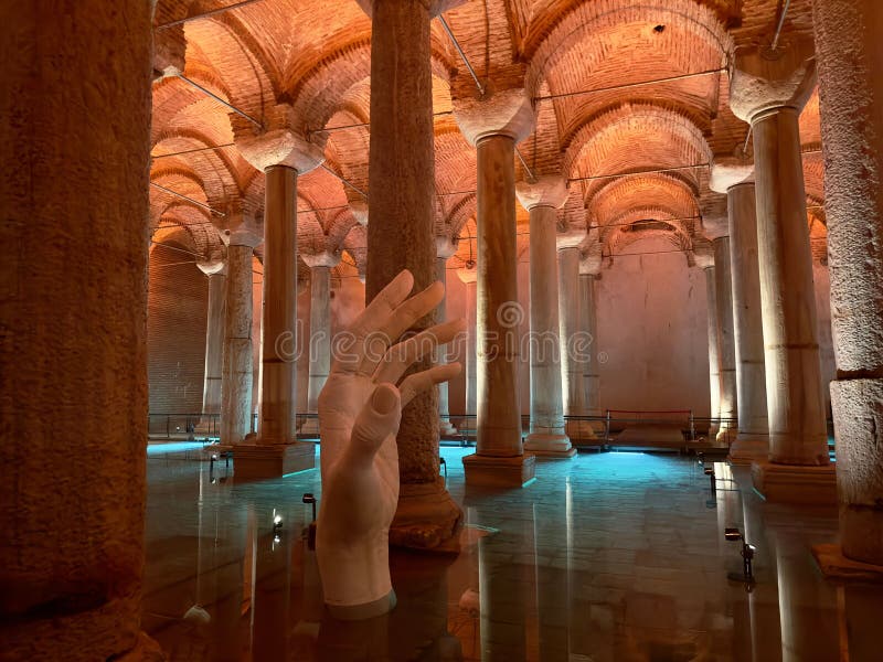 Statue of a Hand and the Columns are Reflected in Water in Basilica ...