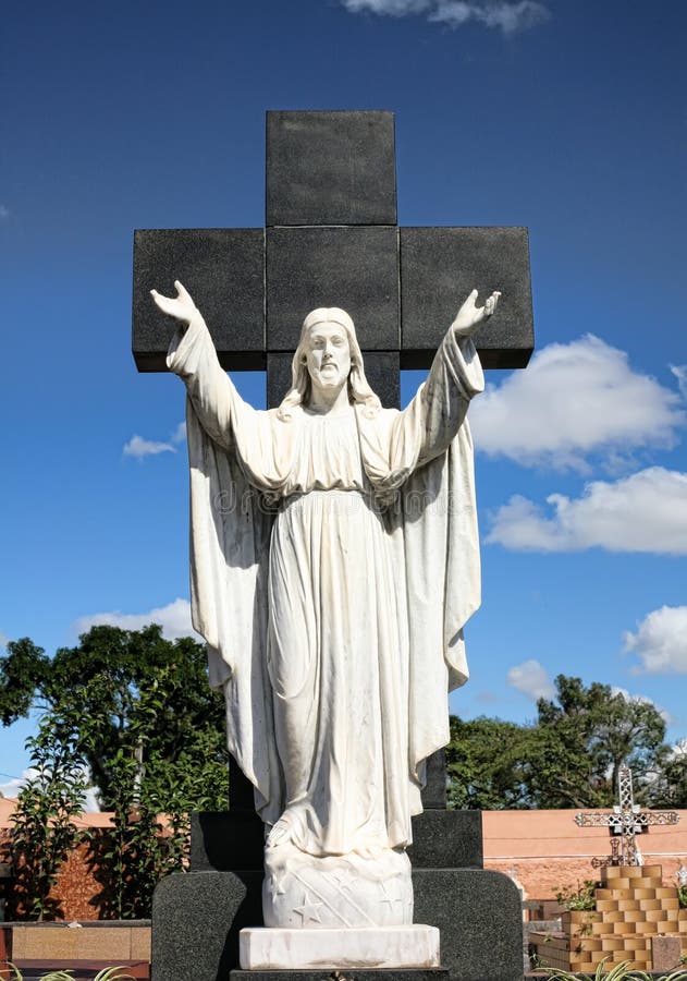 Statue of Jesus with Hands Raised Stock Image - Image of robe, raised ...