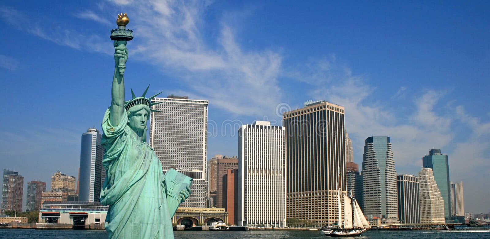 The Statue of Liberty and New York City Skyline Stock Photo - Image of ...